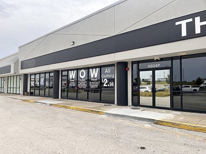 The unassuming storefront promises treasures within. That "WOW" sign isn't just clever marketing—it stands for Women, Orphans, Widows, revealing the store's charitable mission.