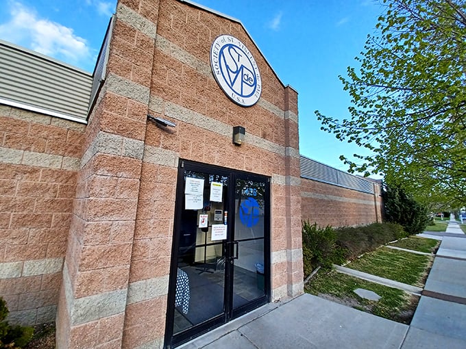 Another entrance to this charitable wonderland, where the blue logo promises both deals and the warm feeling of supporting a good cause.