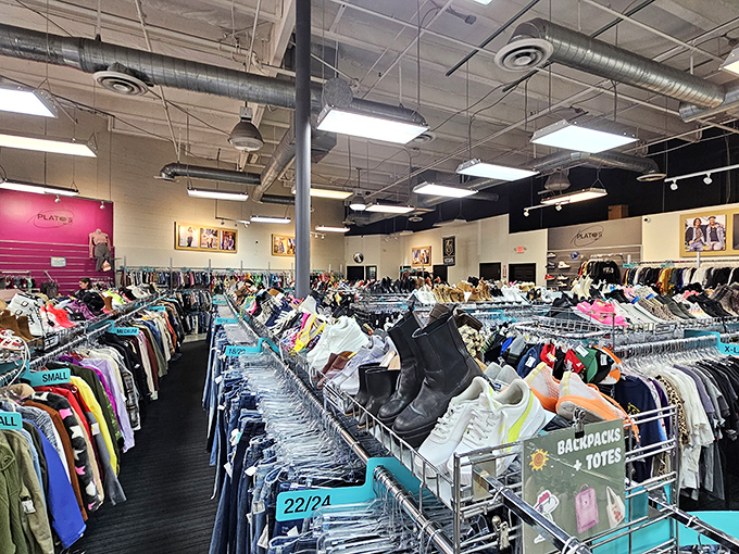 The motherlode of affordable fashion! Organized chaos that somehow makes perfect sense, with shoes perched atop racks like fashion sentinels guarding their clothing kingdoms.