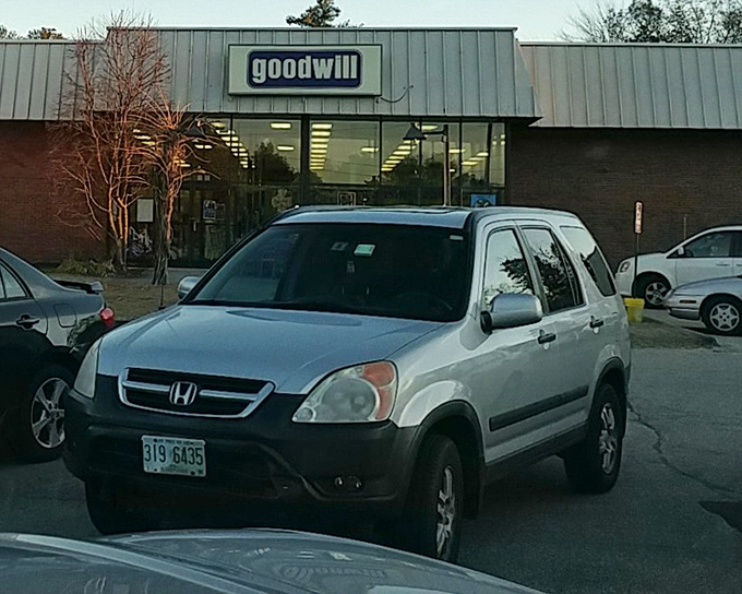 The Goodwill storefront stands ready for treasure hunters, like a museum where you can actually take things home.