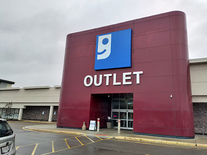 The unmistakable red facade of Goodwill Outlet in Canton beckons bargain hunters like a beacon of thrifty possibility.