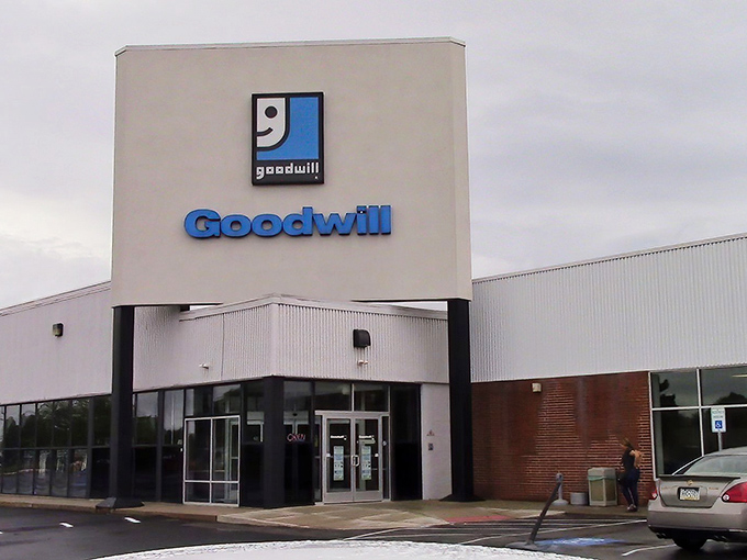 The iconic blue Goodwill smile logo welcomes bargain hunters to this Montgomeryville treasure trove, where fashion finds await the patient explorer.