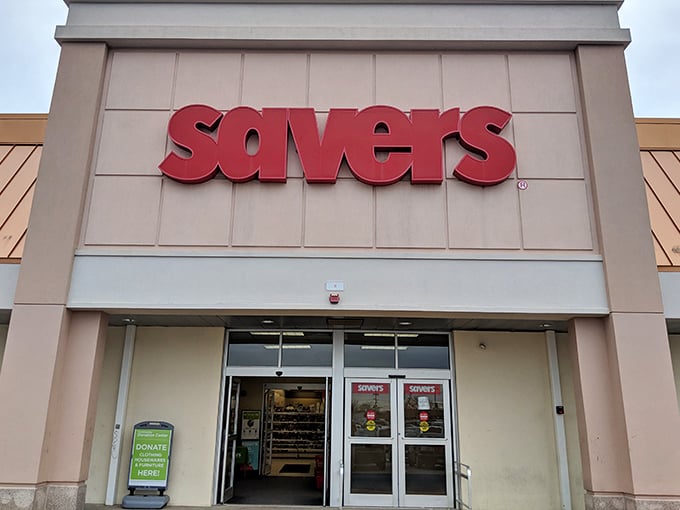 The iconic red Savers sign beckons like a lighthouse for treasure hunters. Inside awaits a wonderland of possibilities and second chances.
