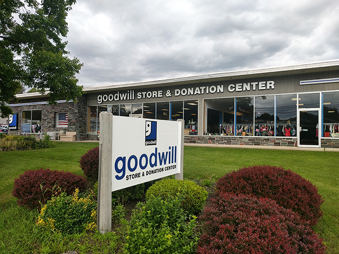 The treasure hunt begins! Rutland's Goodwill welcomes bargain hunters with its signature blue signage and neatly landscaped entrance.
