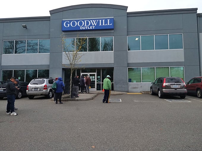 The unassuming exterior of bargain paradise. Like a treasure chest disguised as an office building, this Goodwill Outlet holds untold wonders within its walls.