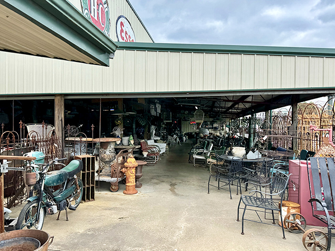 The outdoor treasure trove at Arkansas Peddlers Antique Mall looks like a yard sale organized by design geniuses. Vintage patio furniture mingles with architectural salvage under the big Arkansas sky.