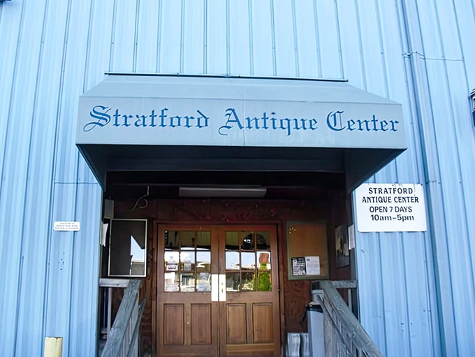 The unassuming blue exterior hides a universe of treasures within, like finding a portal to the past behind those wooden doors.