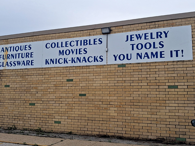 The exterior sign says it all: "ANTIQUES, FURNITURE, GLASSWARE, COLLECTIBLES..." and ends with the delightfully honest "YOU NAME IT!" Truth in advertising at its finest.