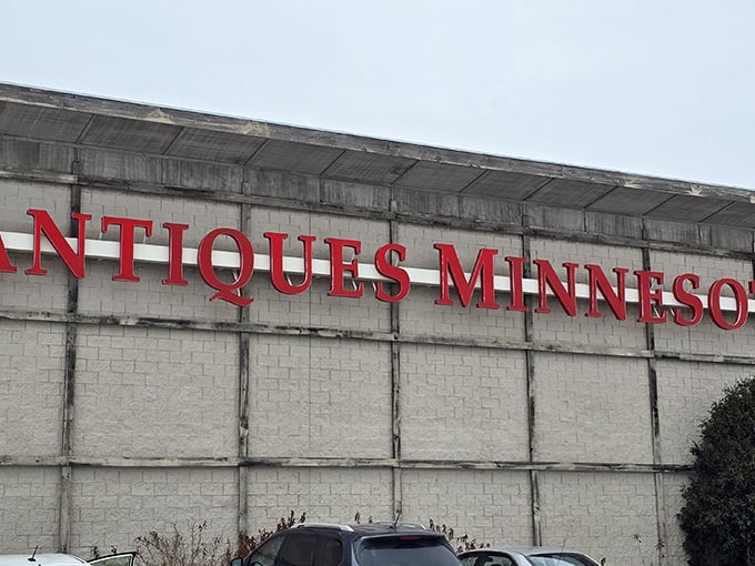 The bold red lettering against concrete gray isn't just signage&mdash;it's a beacon calling to collectors and nostalgia-seekers alike.