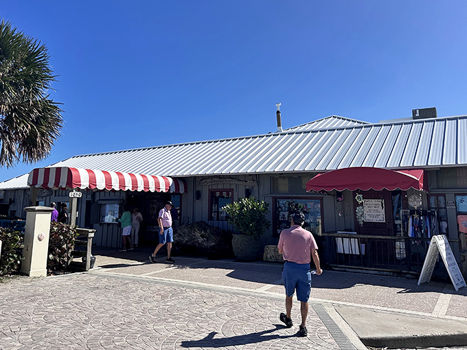 The iconic red and white awnings of Ocean Grill welcome you like an old friend who happens to make the best seafood in town.