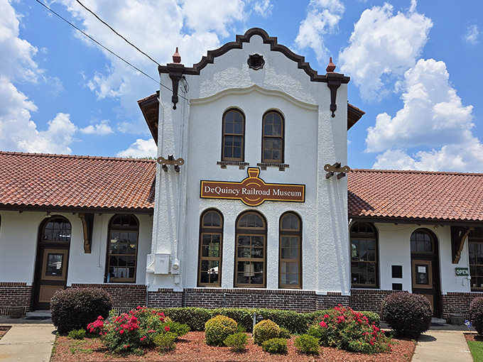 Spanish Mission elegance meets Louisiana charm in this meticulously preserved depot. The vibrant flower beds seem to welcome visitors just as they did for weary travelers a century ago.