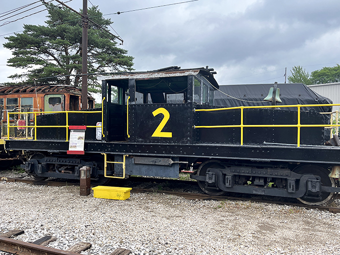 Locomotive #578 stands proudly at the Ohio Railway Museum, its gleaming headlight and American flags telling stories of journeys past. Iron horse poetry in metal and steam.