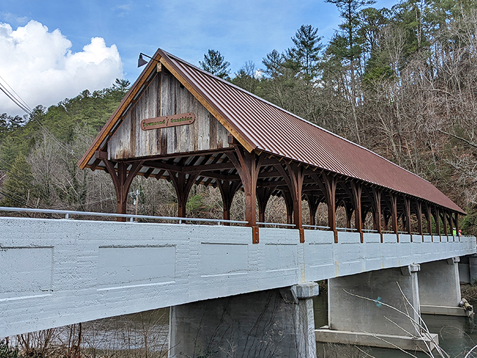 Morning light plays across the bridge's weathered facade, where the "Townsend/Sunshine" sign welcomes visitors to cross into a simpler time.