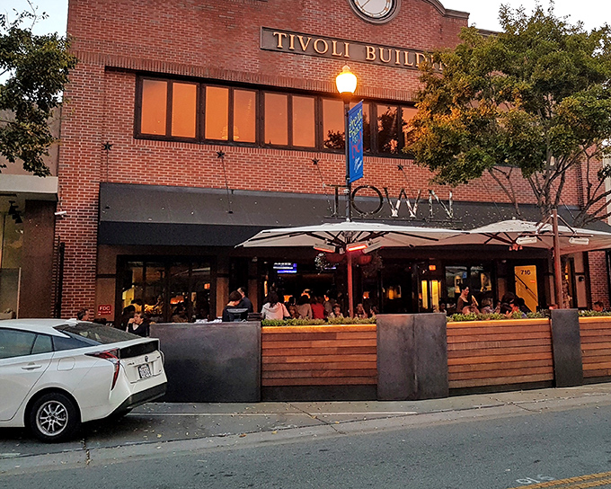 As evening falls, Town transforms into a neighborhood hotspot, where locals gather under warm lights for good food and even better conversation.