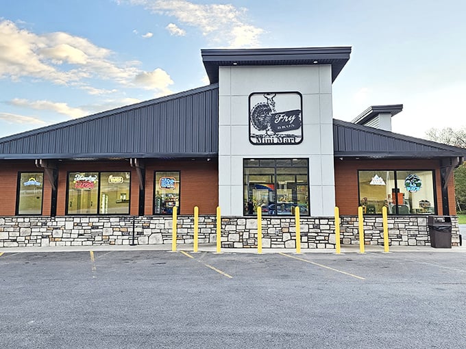 The welcoming exterior of Fry Bros Turkey Ranch, with its modern design, stone accents, and iconic turkey logo beckoning hungry travelers.
