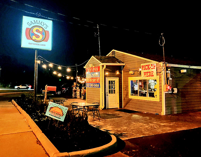 When night falls, Sammy's transforms into a beacon of burger hope with its illuminated sign and string lights promising delicious refuge from hunger.