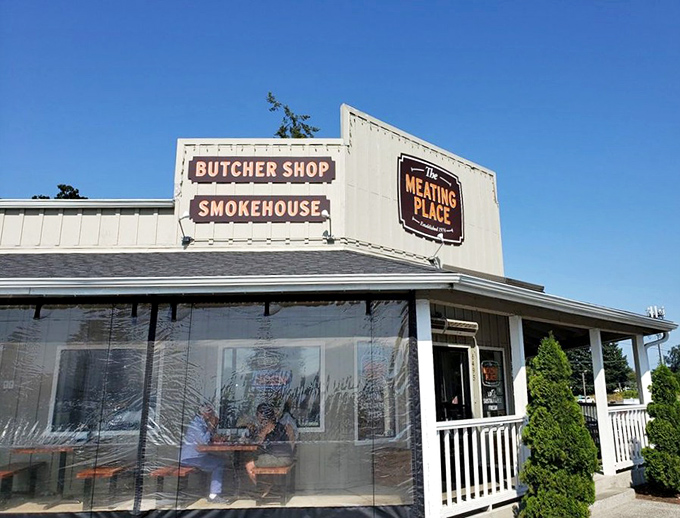The unassuming exterior of The Meating Place hides culinary treasures within. Like finding a diamond in a hardware store, this butcher shop/smokehouse combo promises meaty delights.