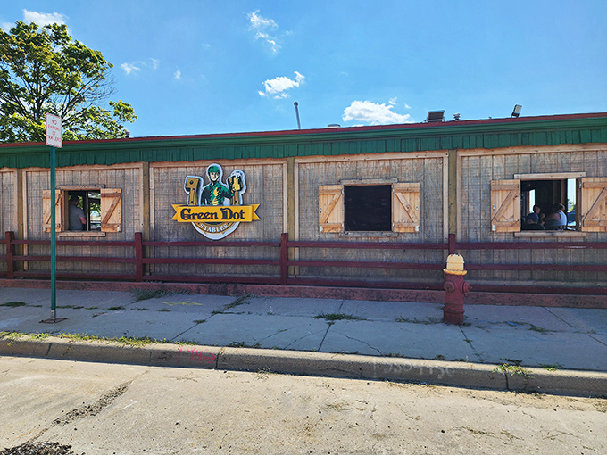 The stable-themed exterior hints at the equestrian adventure waiting inside, where sliders race to your table instead of horses.