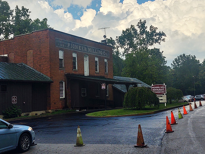 The historic Pioneer Mill building stands proudly in Tiffin, its red brick facade and "PIONEER MILLING CO." signage hinting at delicious transformations within.