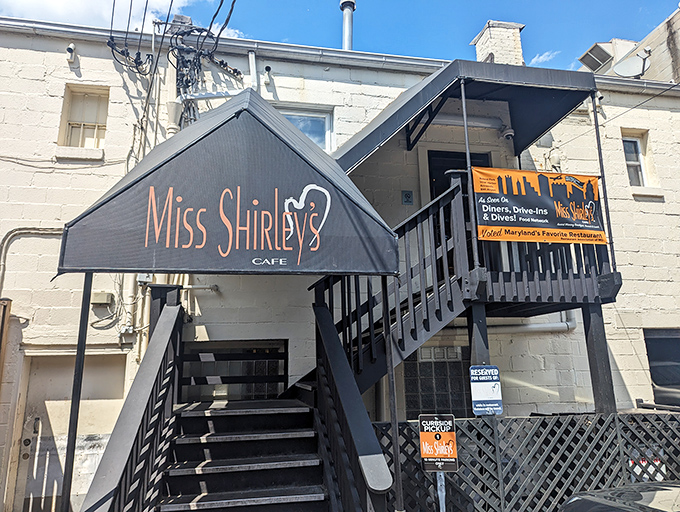 The iconic black awning with orange lettering promises breakfast nirvana &ndash; like spotting an oasis after wandering a desert of mediocre morning meals.