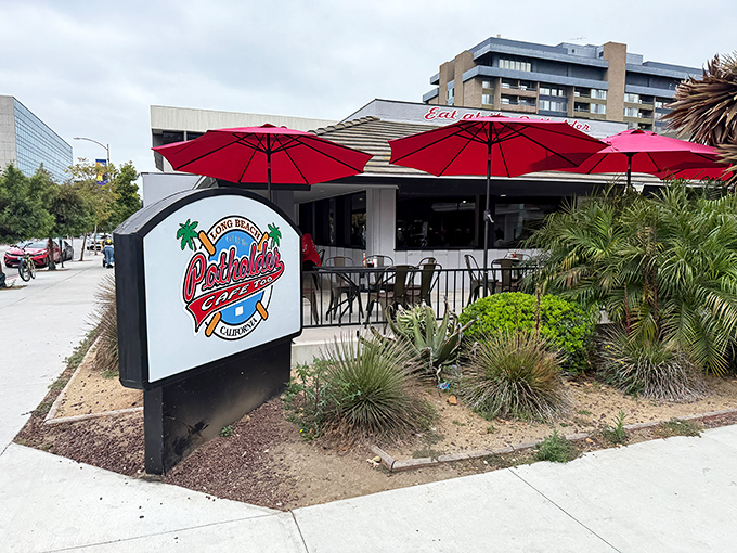 Red umbrellas and desert landscaping create that quintessential SoCal vibe&mdash;breakfast with a side of sunshine.