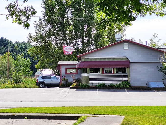 The unassuming exterior of Martha's Diner stands like a time capsule of Americana, promising comfort food that hugs your soul from the inside.