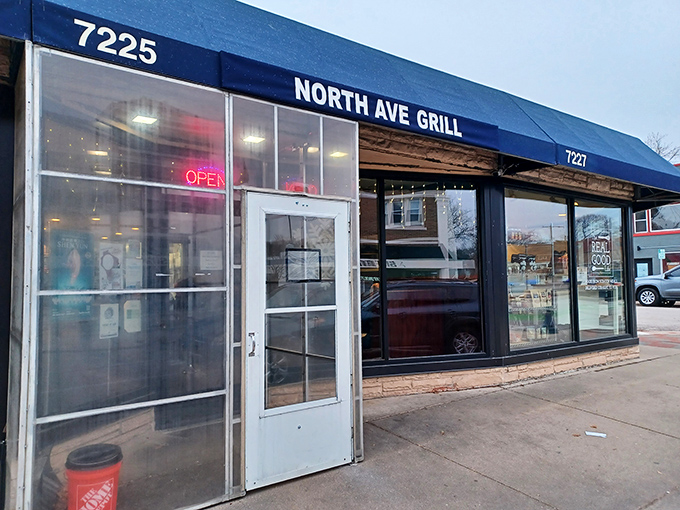 That distinctive blue awning on North Avenue marks the spot where breakfast dreams come true every single morning.
