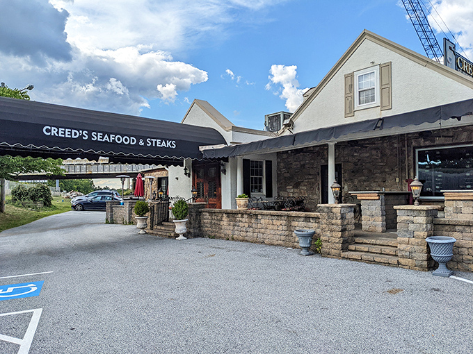 Stone walls and black awnings welcome you to Creed's&mdash;like finding a secret clubhouse where the password is "delicious seafood" and everyone's invited.