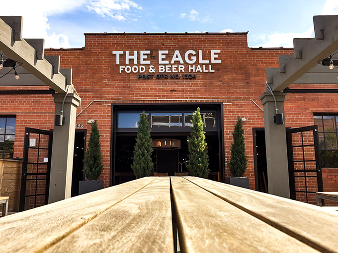 The brick facade of The Eagle beckons like a siren song to fried chicken enthusiasts. Southern comfort meets Columbus cool.