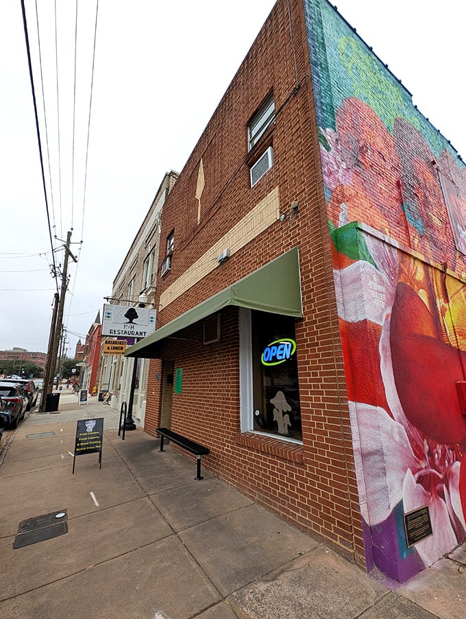 The unassuming brick exterior of H&H Restaurant in Macon hides culinary treasures that have kept locals coming back for generations.