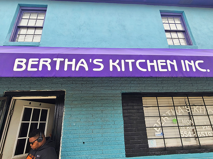 The unmistakable turquoise and purple exterior of Bertha's Kitchen stands out like a delicious beacon of soul food salvation in North Charleston.