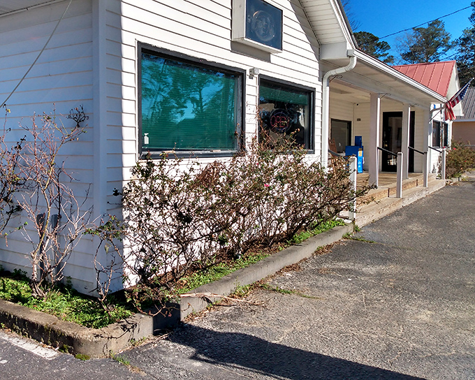 That white clapboard exterior hides some serious culinary magic, proving the best restaurants never need flashy signs.