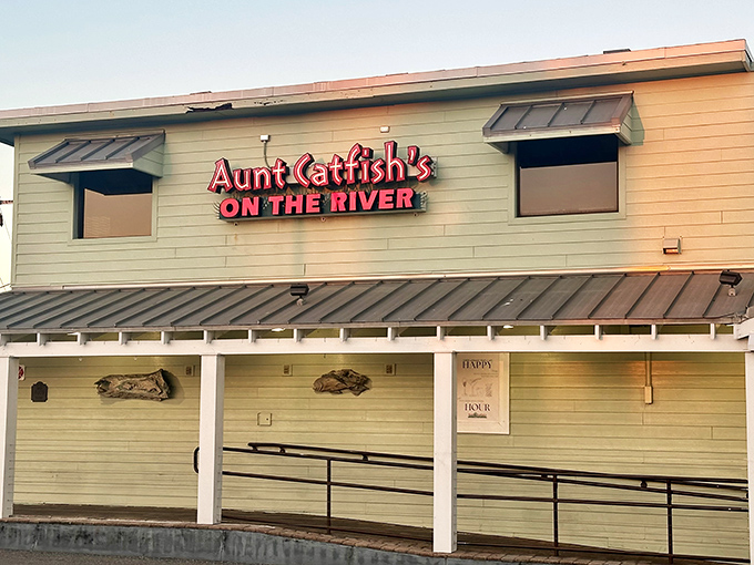 The mint-green facade of Aunt Catfish's welcomes hungry visitors like an old friend, promising riverside comfort and those legendary cinnamon rolls within.