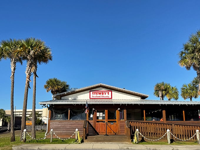 Florida sunshine meets seafood dreams at Stewby's, where the bright blue sky and palm trees create the perfect backdrop for your next seafood adventure.