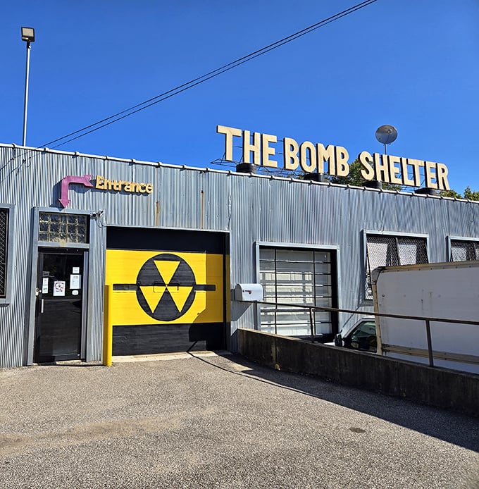 The corrugated metal exterior with its bold yellow entrance door and nuclear symbol promises a blast from the past inside this Akron treasure trove.