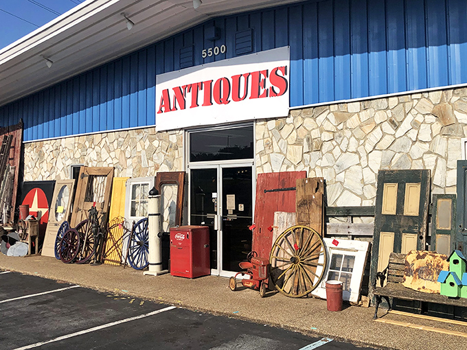 The blue-roofed time capsule beckons with its stone facade and vintage Coca-Cola machine standing guard. History's waiting room has plenty of parking.
