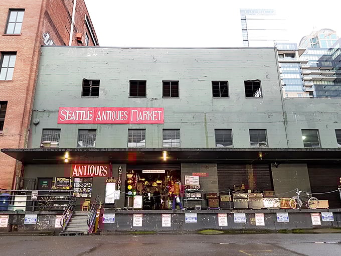 The mint-green facade with its bold red signage stands like a time portal on Seattle's waterfront, beckoning treasure hunters inside.