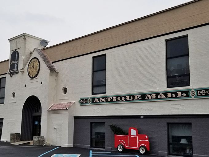 The white brick fa&ccedil;ade with its distinctive clock tower isn't just a building&mdash;it's a time machine disguised as an antique mall.
