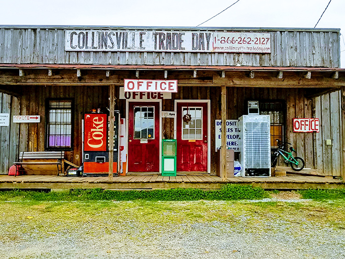 The weathered wooden facade of Collinsville Trade Day's office building stands as a testament to decades of bargain hunting. Southern charm meets commerce under that iconic sign.