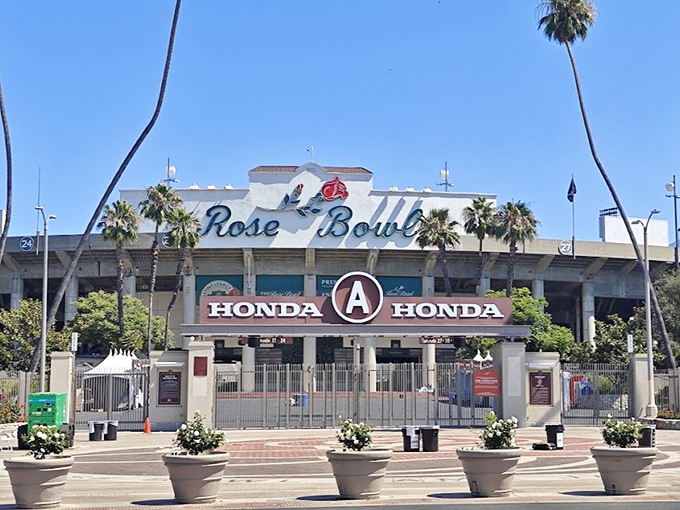 The iconic Rose Bowl Stadium transforms once a month from sports arena to treasure hunter's paradise, where bargains await under those swaying California palms.