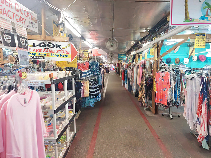 Clothing racks stretch to the horizon like a textile rainbow, promising fashion treasures at prices that won't require a second mortgage.