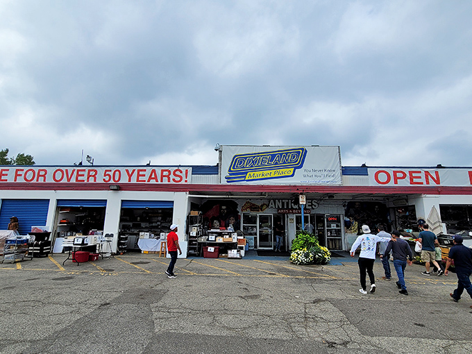 The iconic red, white, and blue exterior of Dixieland Flea Market has been beckoning bargain hunters for decades.