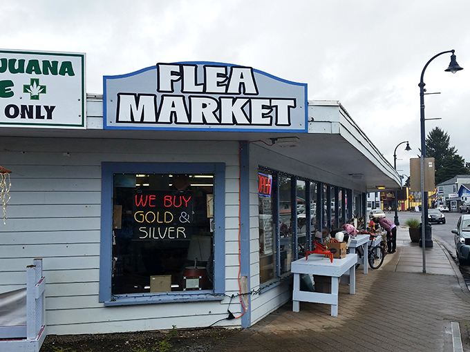 The unassuming exterior of Waldport Flea Market promises treasures within, complete with quirky Halloween decorations and that unmistakable Oregon blend of cannabis and collectibles.