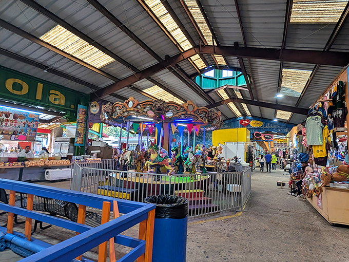 A carousel of childhood dreams sits at the heart of the market, proving shopping is just half the adventure here.