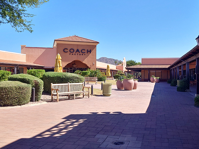 The desert sun bathes Coach Factory in golden light, while palm-framed mountains remind you this bargain paradise is quintessentially Arizona.