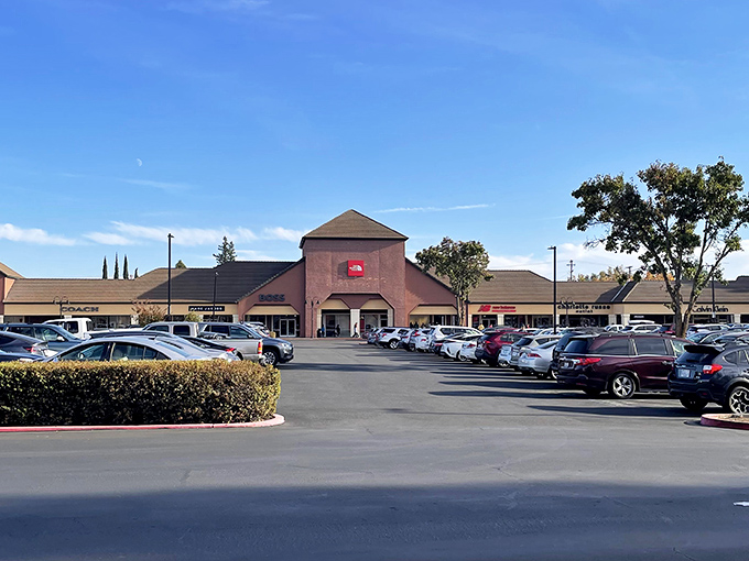 The North Face store beckons shoppers under California's impossibly blue sky, promising adventure gear without the adventure-sized price tags.