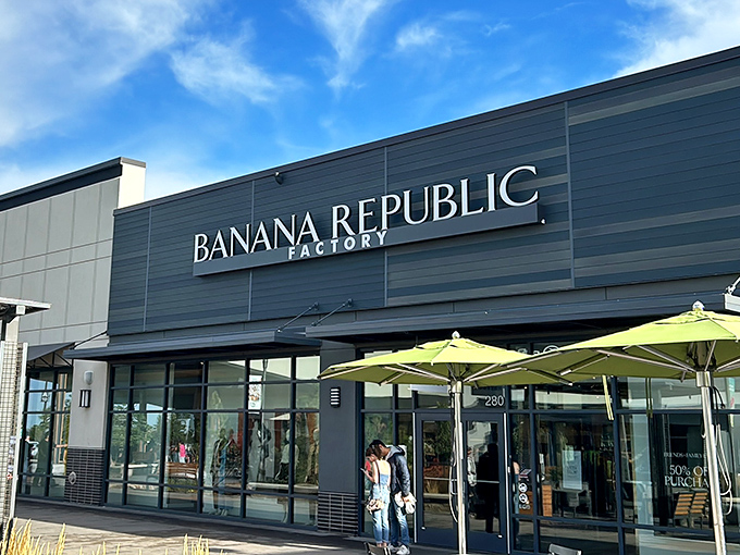 The modern oasis of Denver Premium Outlets beckons shoppers with its contemporary design, blue skies, and the promise of retail therapy without the full-price hangover.