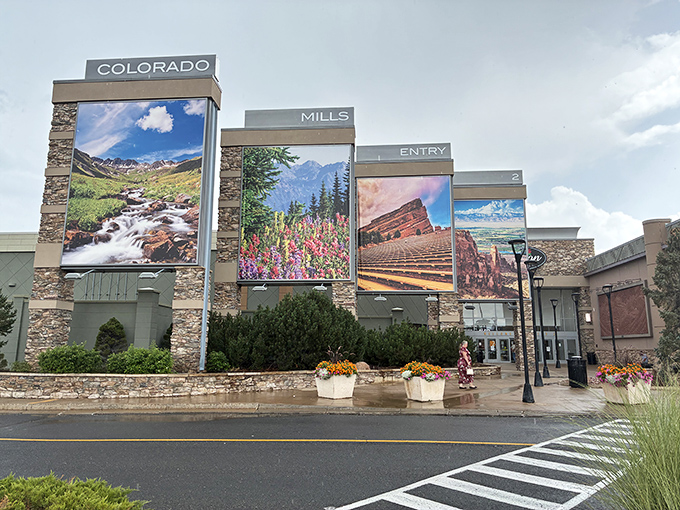Entry towers showcase Colorado's greatest hits – wildflowers, red rocks, and mountain streams – nature's own welcome mat.