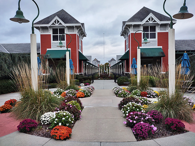The entrance to Westbrook Outlets welcomes shoppers with New England charm that says, "Your wallet may get lighter, but your shopping bags won't!"