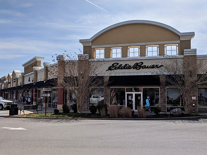 Eddie Bauer's storefront stands ready for adventure, much like its outdoor gear. The stone and brick exterior adds a touch of rustic charm to your shopping expedition.